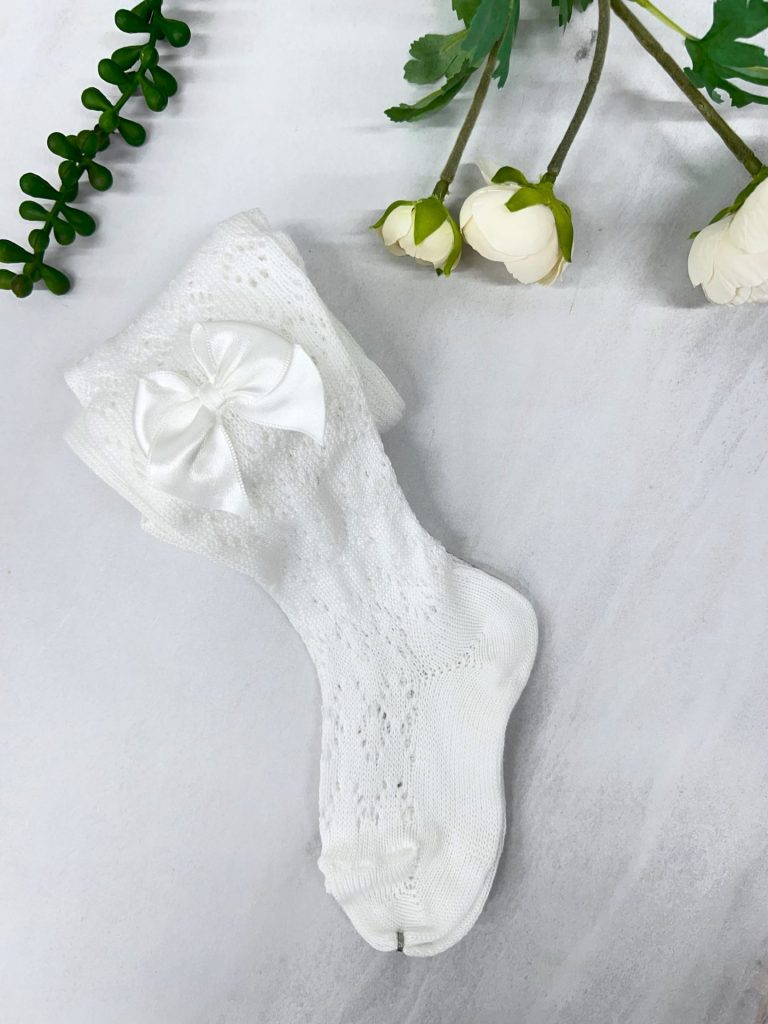 White geometric tights with bow • Petite Kingdom